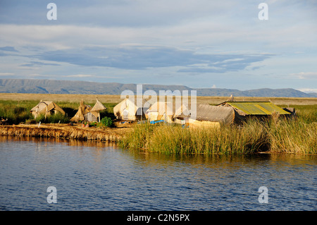 Traditional houes at the floating island in Peru Stock Photo - Alamy