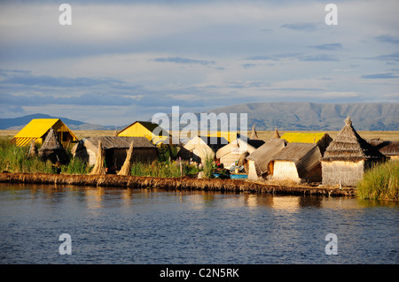 Traditional houes at the floating island in Peru Stock Photo - Alamy