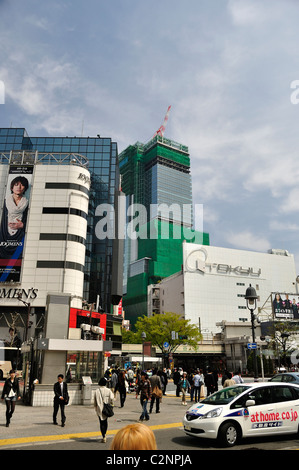 Shibuya crossing and surrounding commercial buildings (QFront, Marui ...