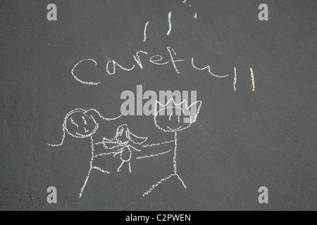Child's Chalk Drawing Two stick figures one crying Cheer Up Stock Photo ...