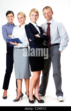 Portrait of friendly business team standing in isolation Stock Photo ...