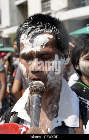 Thai man with powder on his face , Songkran New Year Festival in ...