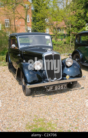 Morris 12 (centre) at a classic, vintage car show outdoors in the rain ...