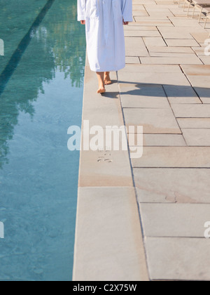 Woman walking near the pool, One & Only Resort Reethi Rah, Maldives, no ...