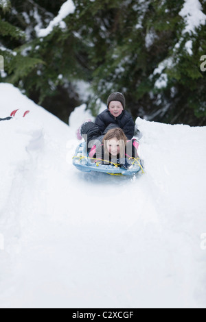 Children sledding in the snow in Washington, D.C., capturing the city's ...