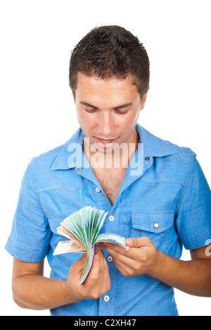 Excited successful man counting money, looking satisfied at cash and ...