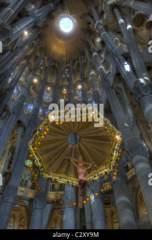 Jesus Cross with interior of the Sagrada Familia, Church of the Atonement of the Holy Family ...