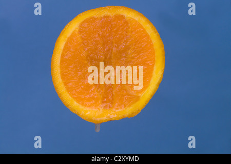 orange dripping juice Stock Photo - Alamy