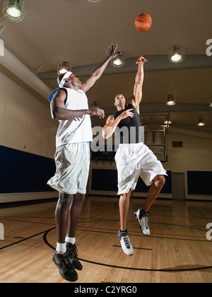 Fitness, exercise and basketball men stretching or workout their body ...