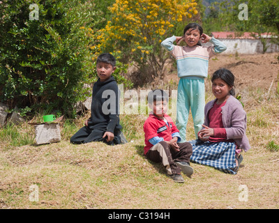Four Guatemalan children play outside near their home in Totonicapan ...