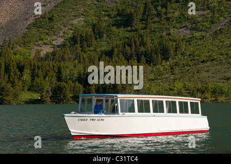 Chief Two Guns tour boat approaching the floating dock on Swiftcurrent ...