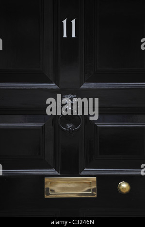 The famous black door at Number 11 Downing Street, traditionally the ...