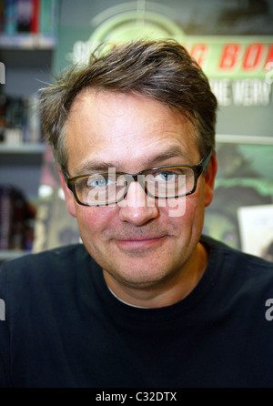 Author Charlie Higson attends a signing session to promote 'SilverFin ...