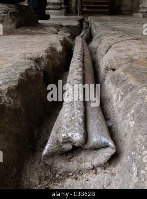 Bath England Roman lead pipe set into the limestone floor of the Roman ...
