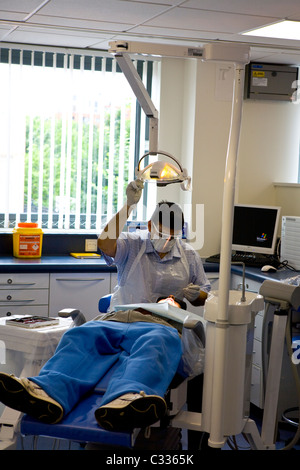Dentist surgery inside the Barkatine poly clinic, East End, London ...