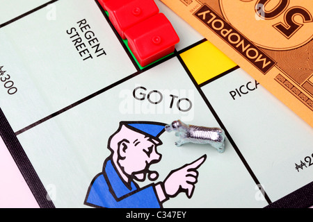 Monopoly board game - Go to Jail and Marvin Gardens spaces Stock Photo ...