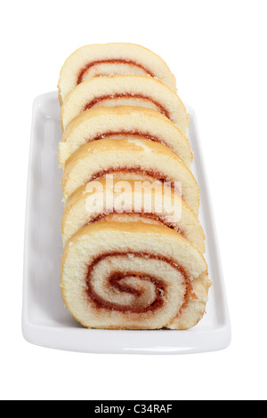 Plate with delicious sponge cake roll, fresh strawberries and floral ...