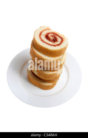 Plate with delicious sponge cake roll, fresh strawberries and floral ...