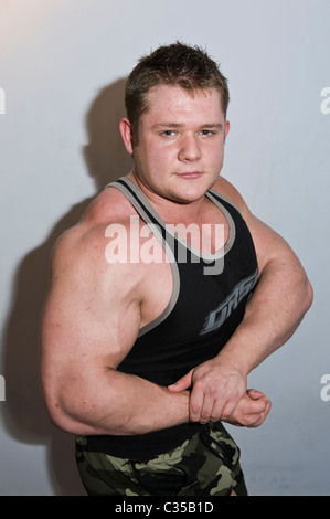 Welsh bodybuilder Rhys Evans pictured working out in a Cardiff gym ...