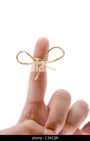 Remember knot and reminder symbol as a string tied on a finger to ...