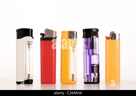 Lighters on white background Stock Photo - Alamy