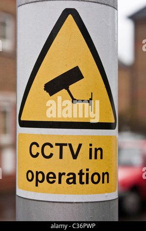 yellow surveillance camera road sign on brick wall, photoarkive Stock ...