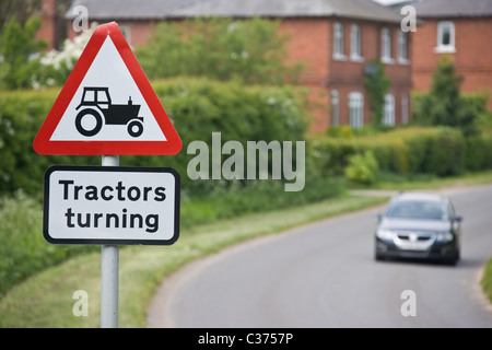 Tractors Turning Road Sign Stock Photo - Alamy