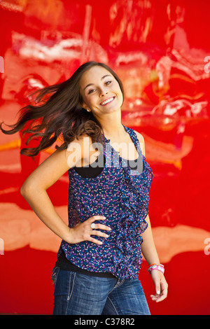 pretty girl facing a wall Stock Photo - Alamy