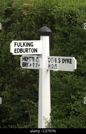 Signpost situated in the village of Poynings, Sussex Stock Photo - Alamy