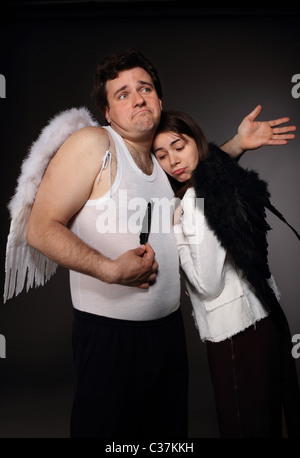 Mr. Angel and Mrs. Angel. Creepy character portrait Stock Photo - Alamy