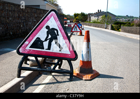Series of road signs warning of road works, the narrowing of the ...