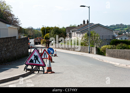 Series of road signs warning of road works, the narrowing of the ...