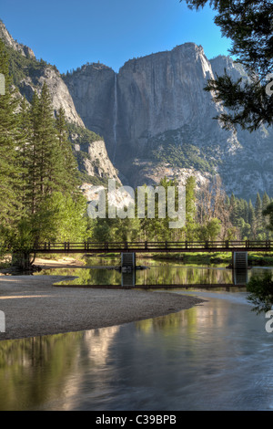 View of Upper Yosemite Fall and Swinging Bridge from the banks of the ...