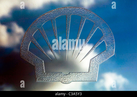 The emblem of the Royal Dutch Shell oil company. Shell is an Stock ...