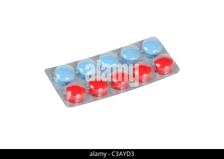 red tablets isolated on white background Stock Photo - Alamy