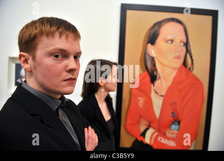 Mark Jameson, winner of the young artist award, with his painting ...