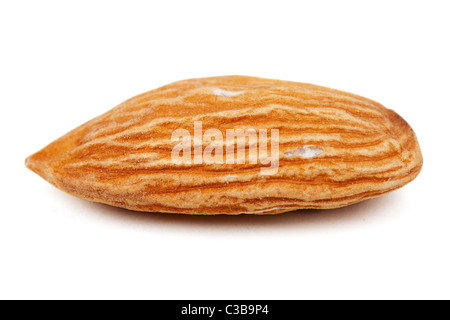 One almond closeup isolated on white background Stock Photo - Alamy