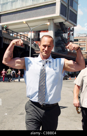 Christopher Meloni shows off his biceps during a break from filming ...