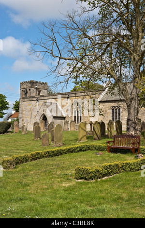 Side door and sign at All Saints Church Thwing East Yorkshire Stock ...