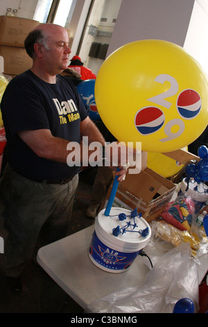 Volunteers inflate tens of thousands of New Year's Eve balloons for ...