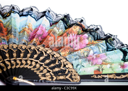 Hand fan with lace isolated on black Stock Photo - Alamy