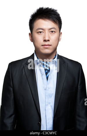 Messy asian office worker portrait isolated on yellow background Stock ...