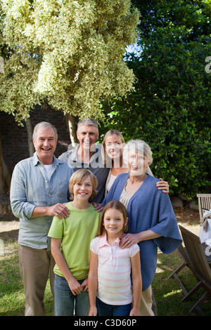 Portrait of joyful family looking at camera and laughing Stock Photo ...