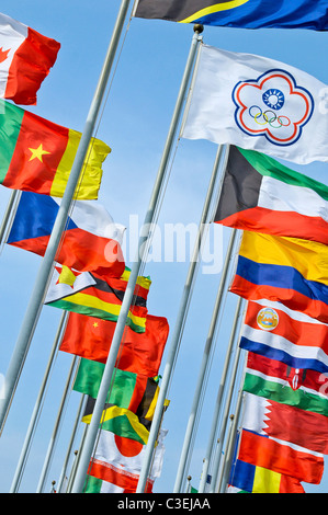 Colorful international flags waving on the Salar de Uyuni close to the ...
