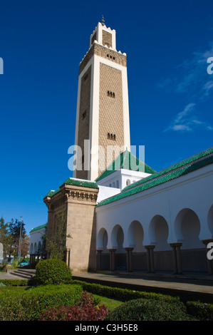 Tangiers, Morocco. Minaret of mosque of Mohammed V and Moroccan flag ...