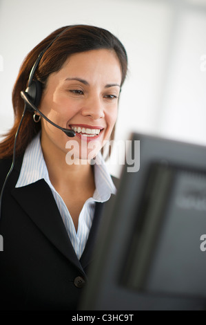 Smiling Female Customer Service Representative Standing Arms Cro Stock ...