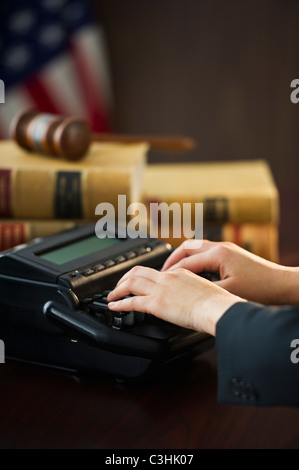 Court stenographer using stenograph machine Stock Photo - Alamy