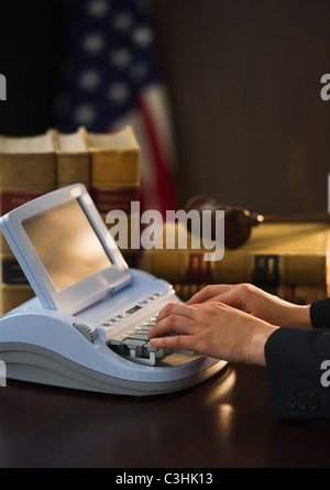 Court stenographer using stenograph machine Stock Photo - Alamy
