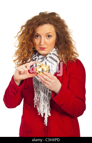 Young redhead woman holding piggy bank very happy and excited, winner ...
