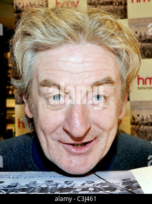 Davy Carton folk rock band The Saw Doctors sign copies of their best of ...